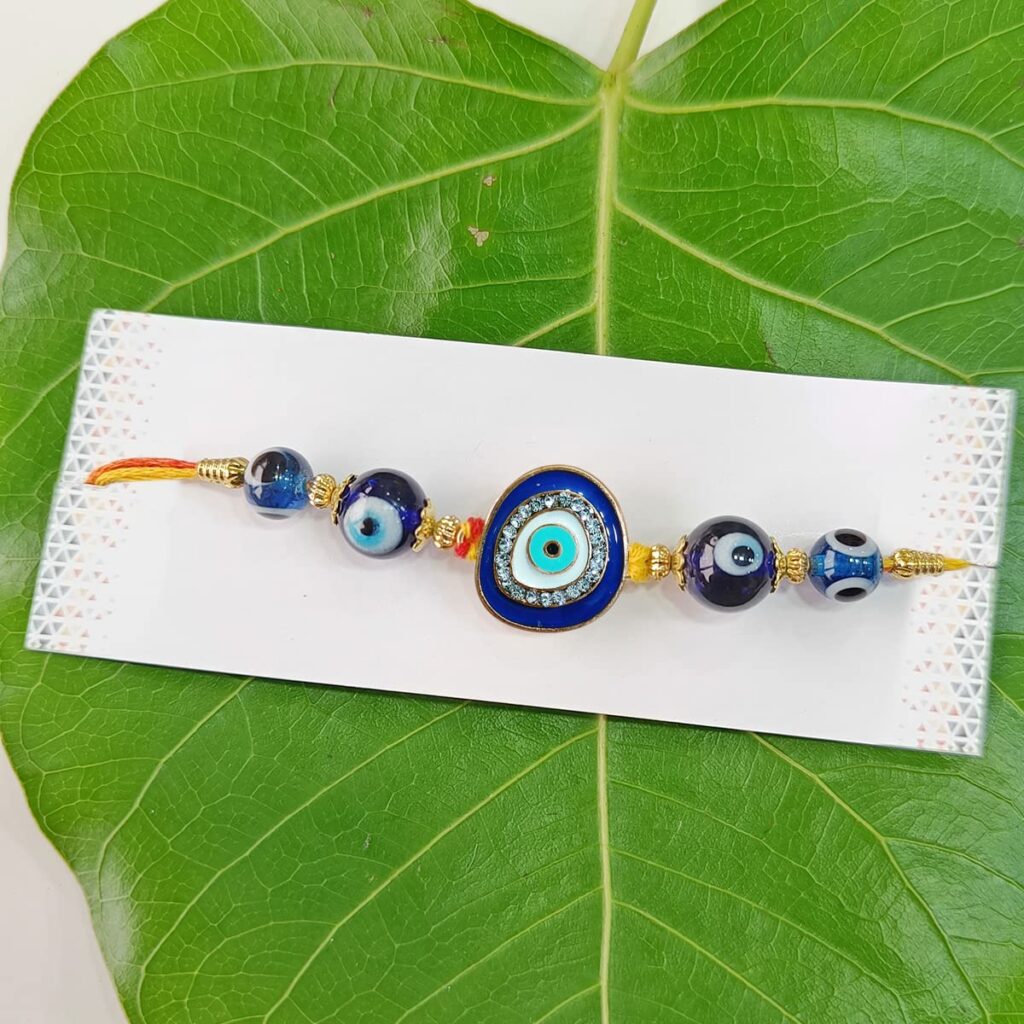 Send Designer Crystals Rakhis to Bhaiya and Bhabhi