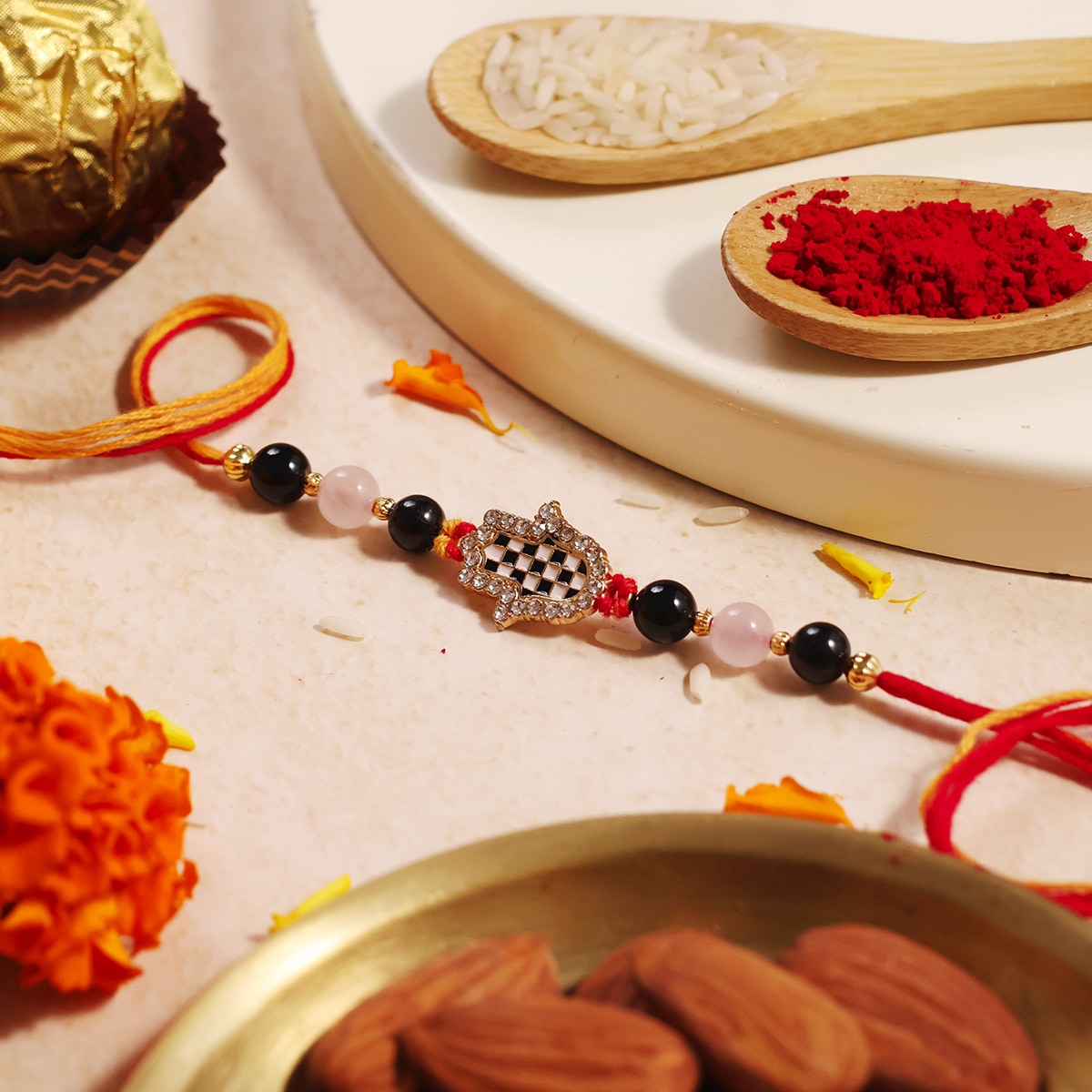 Crystal Rakhi | Buy Online Natural Healing Stone Hamsa Hand Chess Rakhi